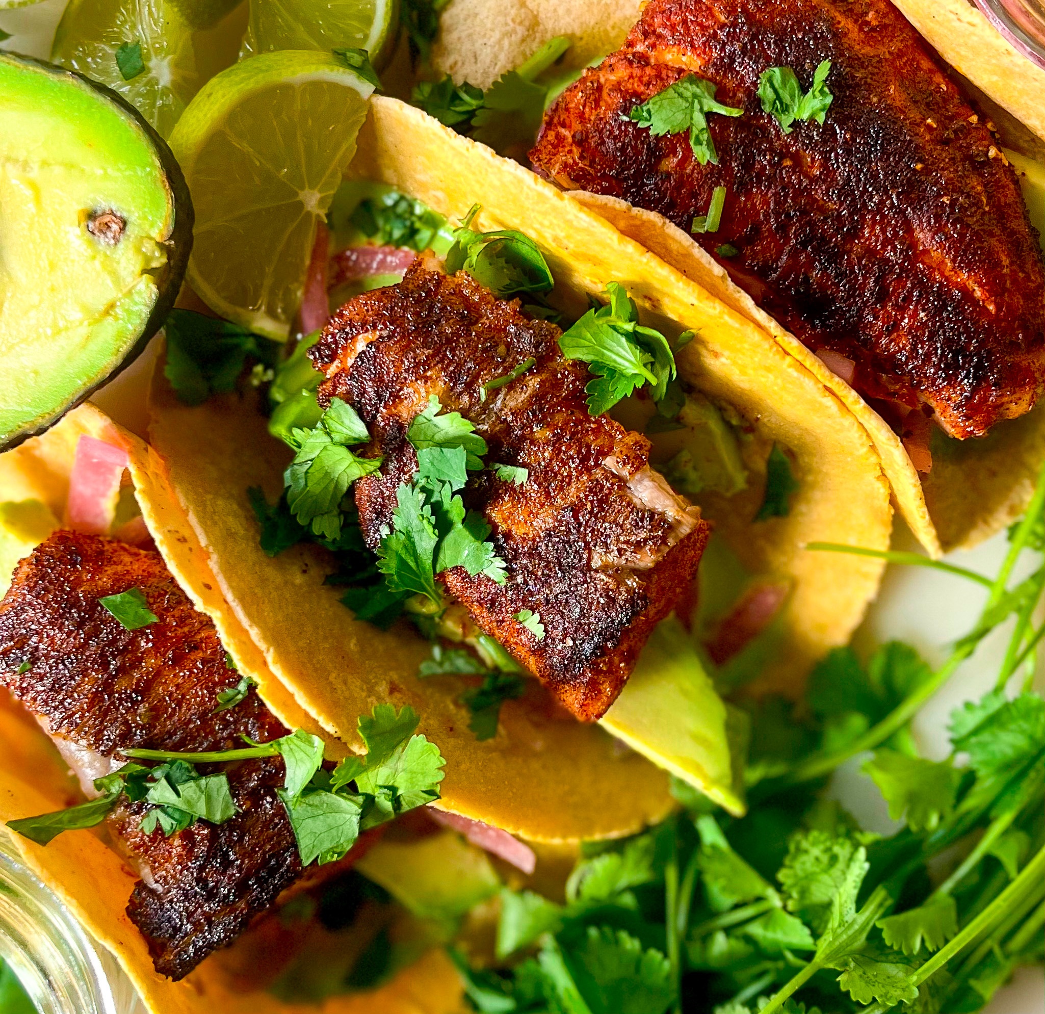 Blackened Salmon Tacos with Serrano Jalapeño Crema – gabrielle in the ...